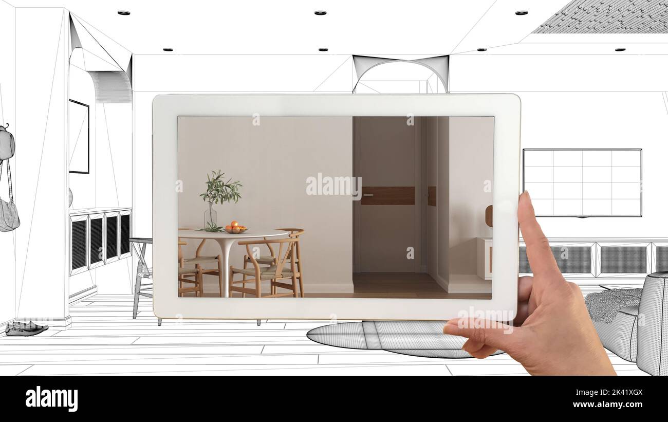 Augmented reality concept. Hand holding tablet with AR application used ...