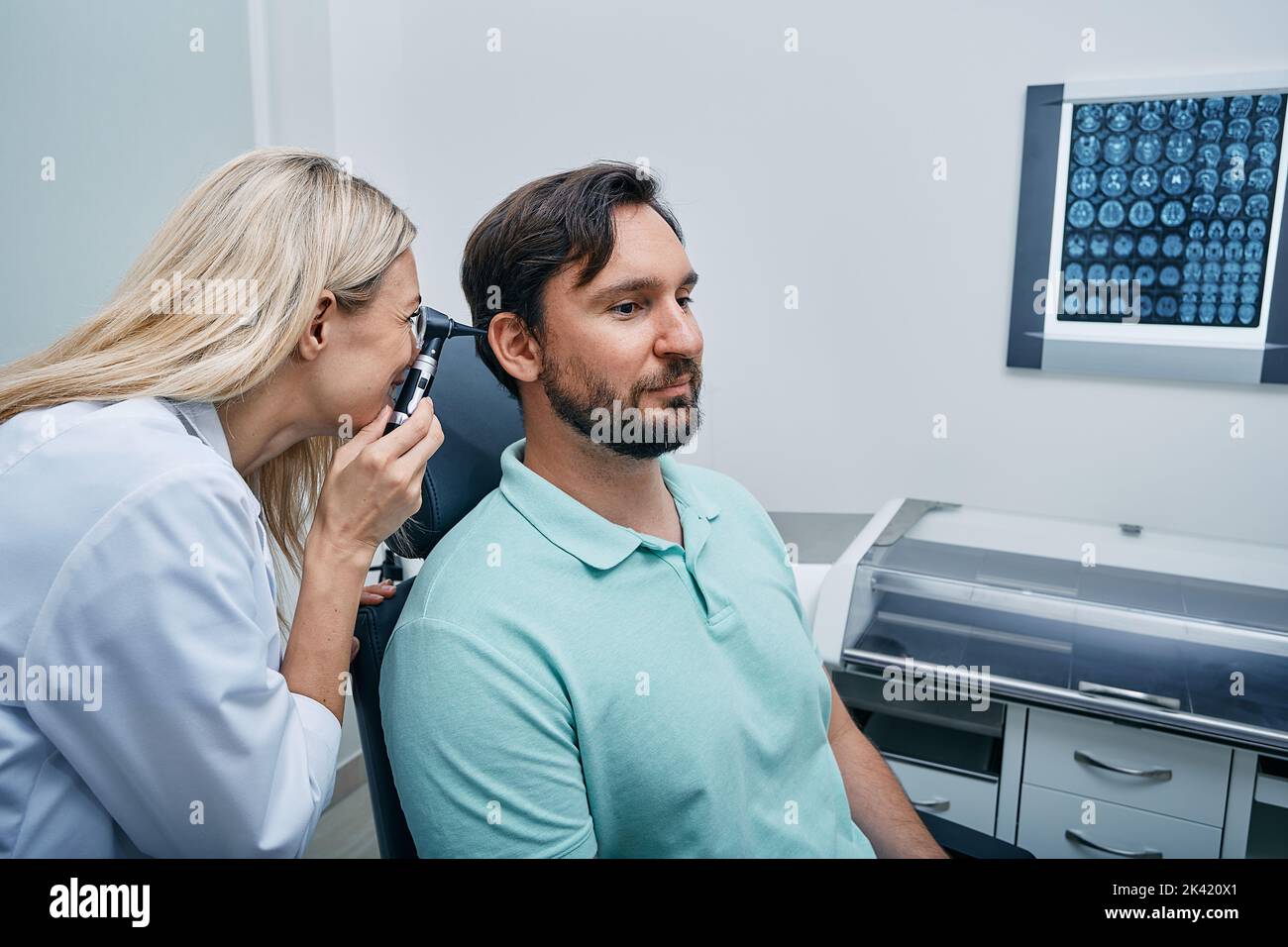 Hearing test for adult people, otoscopy. Otolaryngologist doctor ...