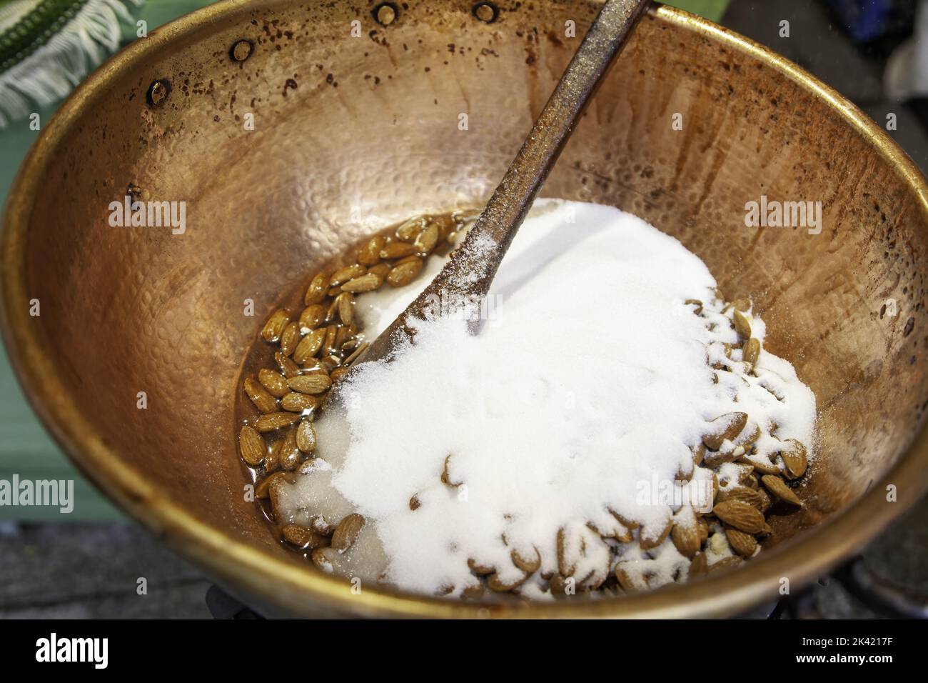 Detail of manufacturing of candied almonds, sugar Stock Photo - Alamy