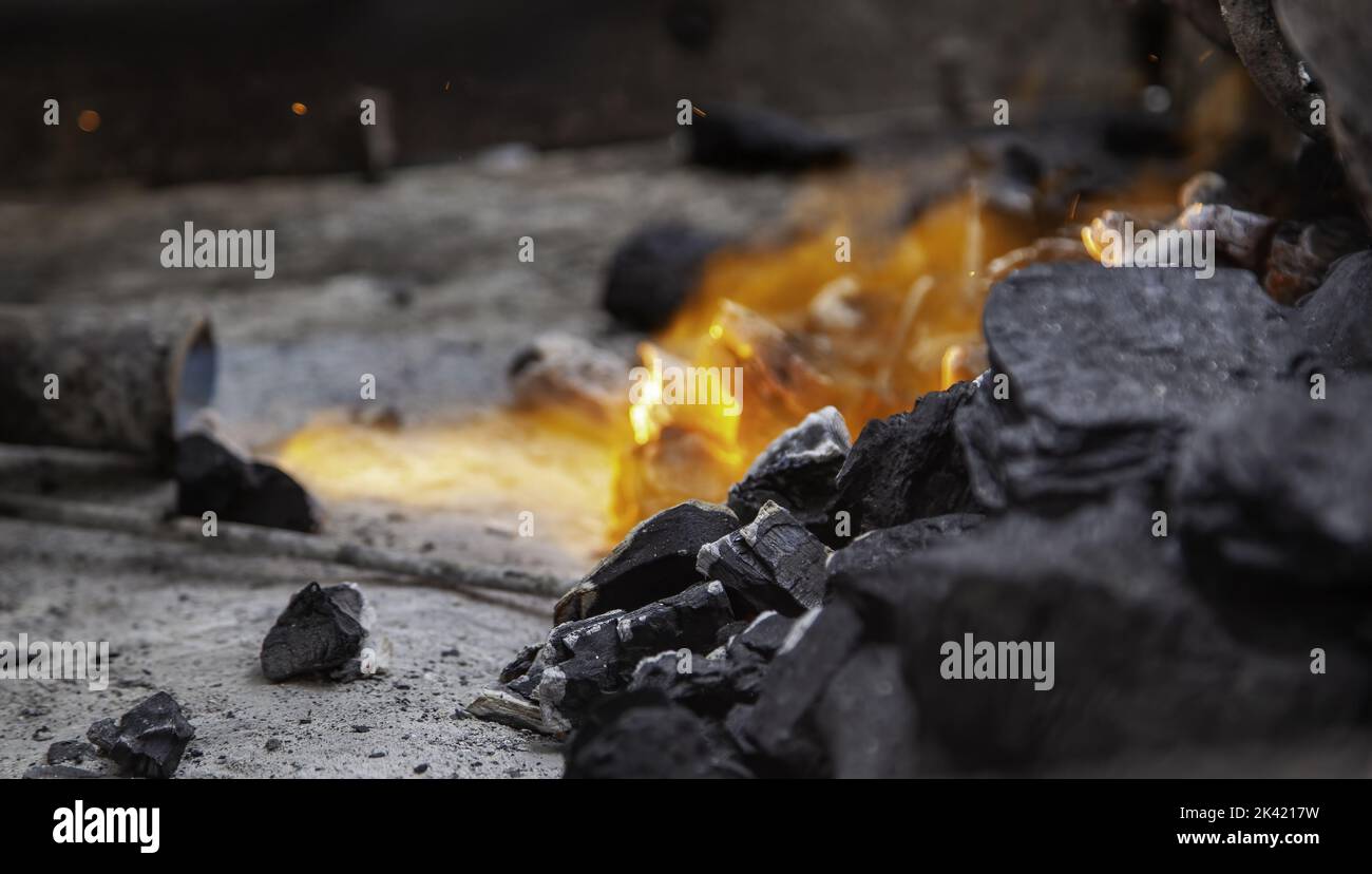 Detail of burning coal with a flame Stock Photo - Alamy