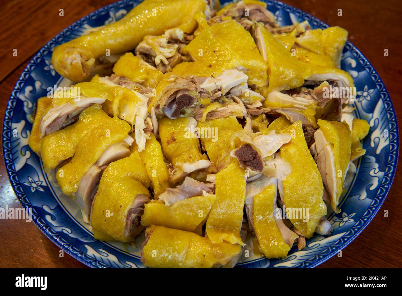 A plate of tender white cut chicken Stock Photo - Alamy