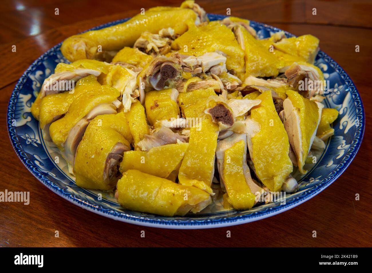 A plate of tender white cut chicken Stock Photo - Alamy