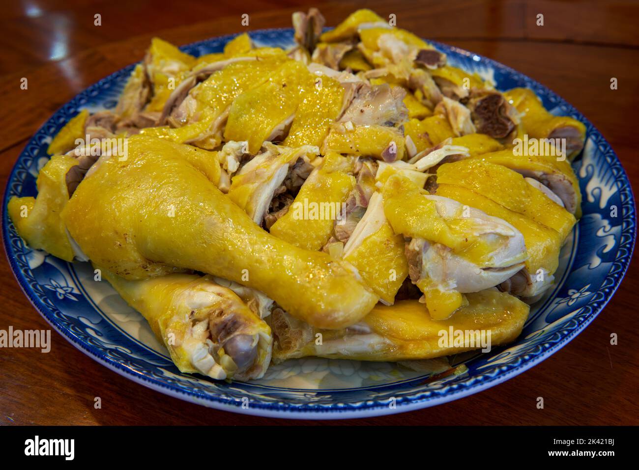 A plate of tender white cut chicken Stock Photo - Alamy