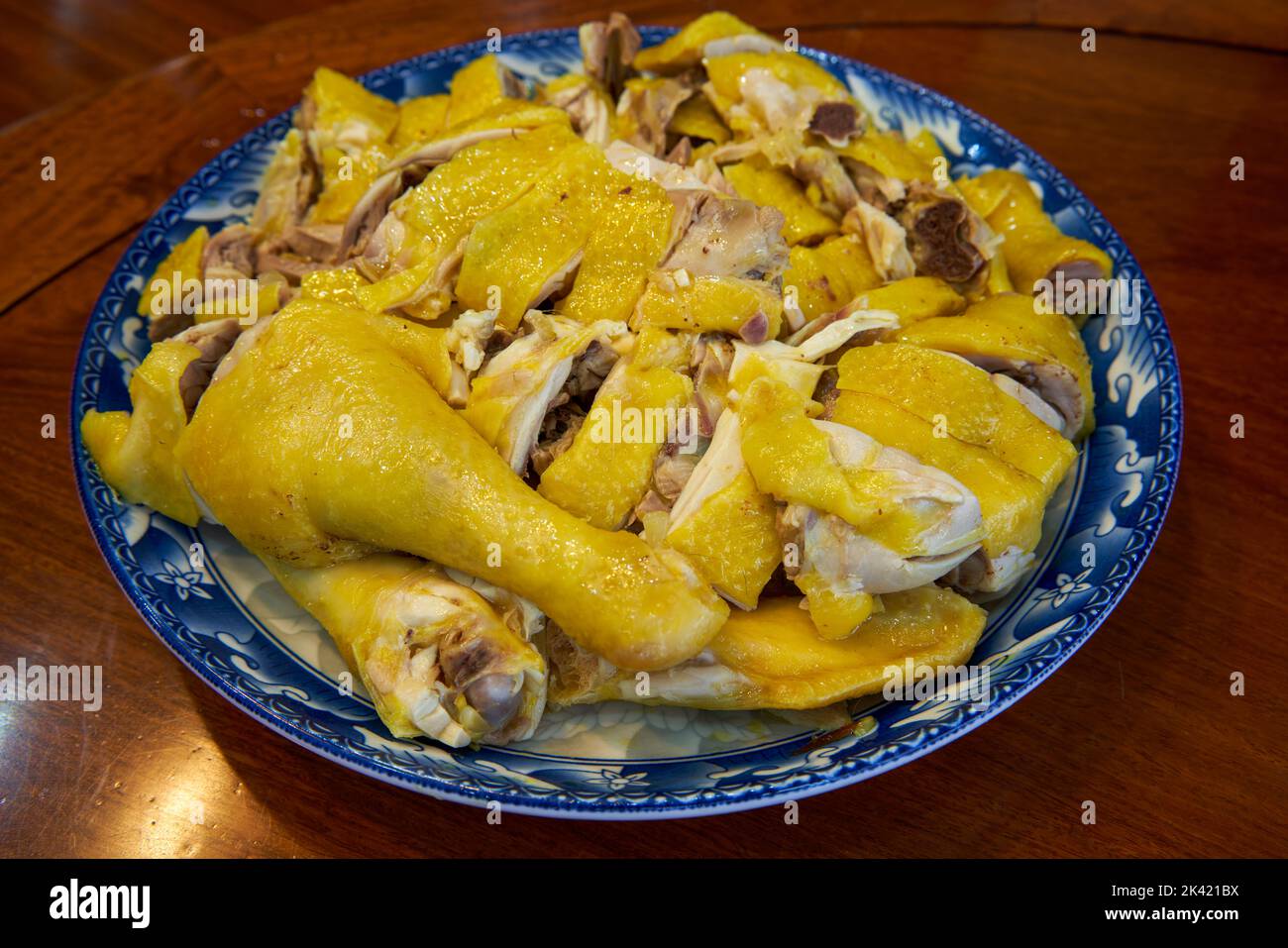 A plate of tender white cut chicken Stock Photo - Alamy