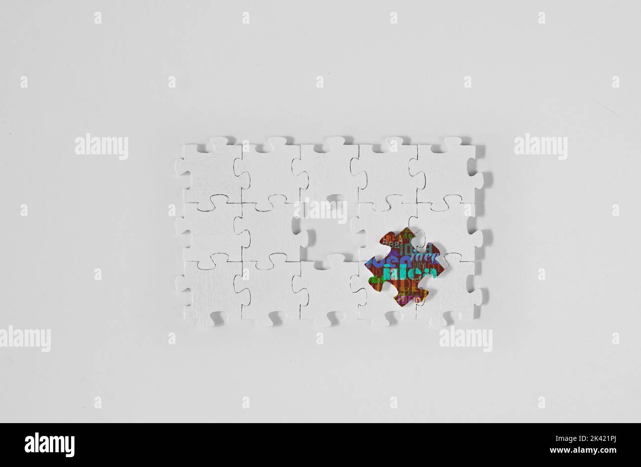 Business concept,top view of jigsaw puzzle with one piece left on white ...