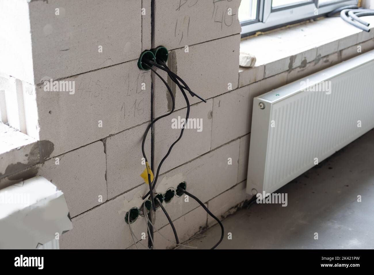 Electrical wiring work at a construction site. Wire extension Stock ...