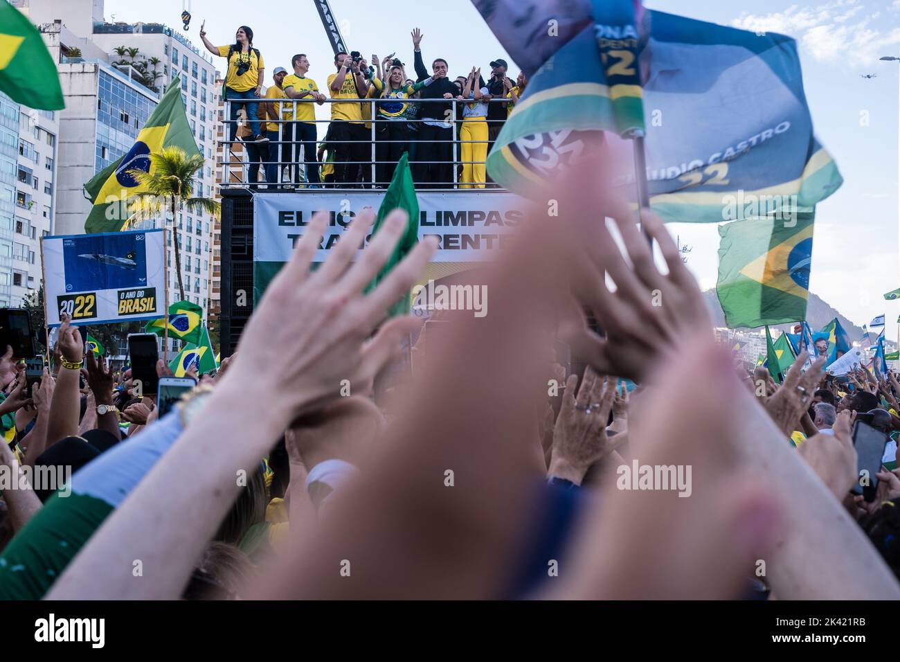 Brazilian President and re-election candidate Jair Bolsonaro speaks to supporters during a ...