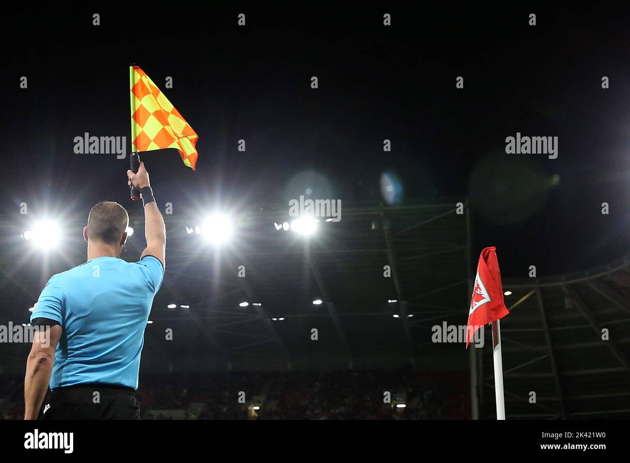 Assistant referee holds up his flag. UEFA Nations league, group D match ...