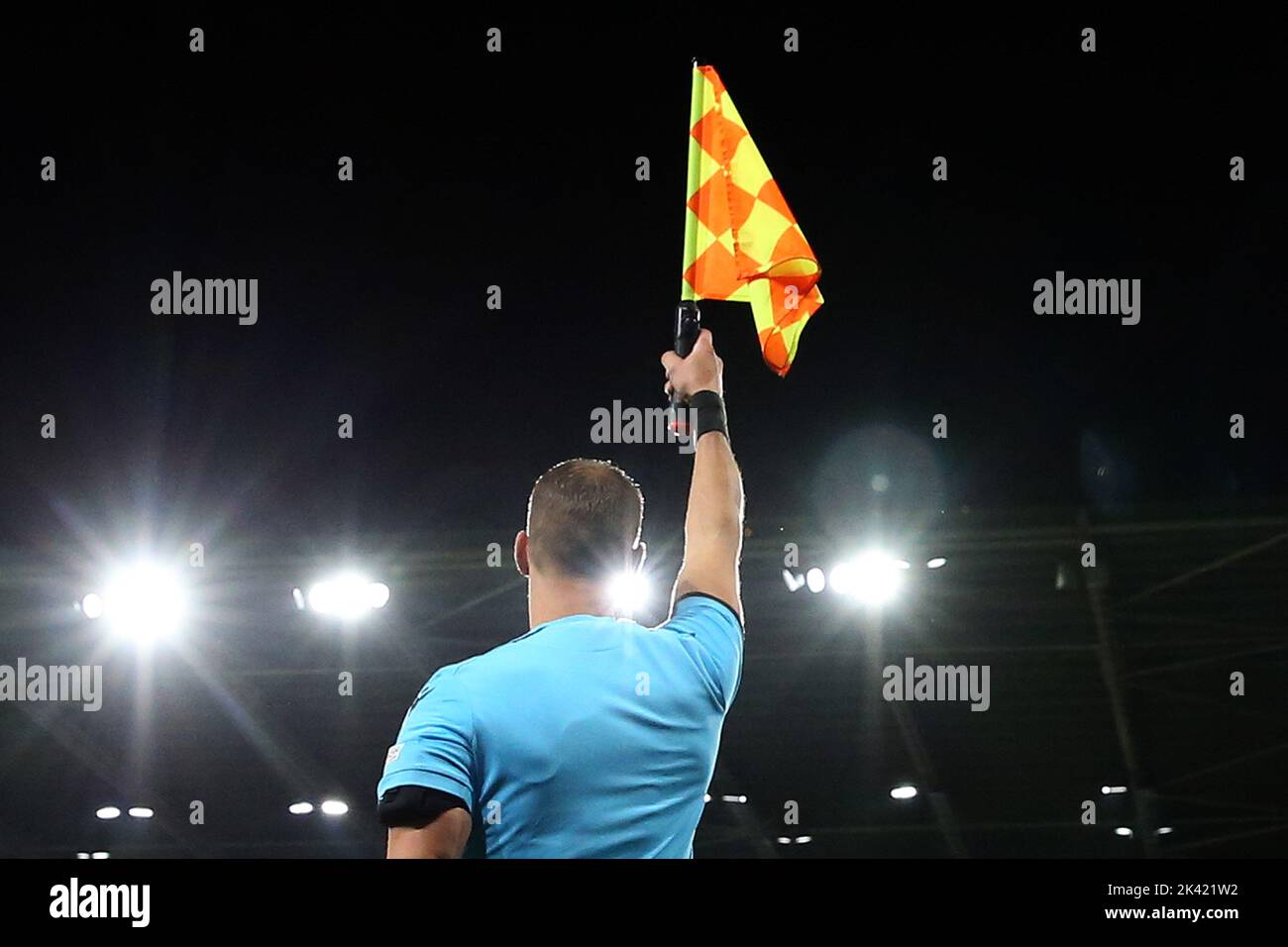 Assistant referee holds up his flag. UEFA Nations league, group D match ...