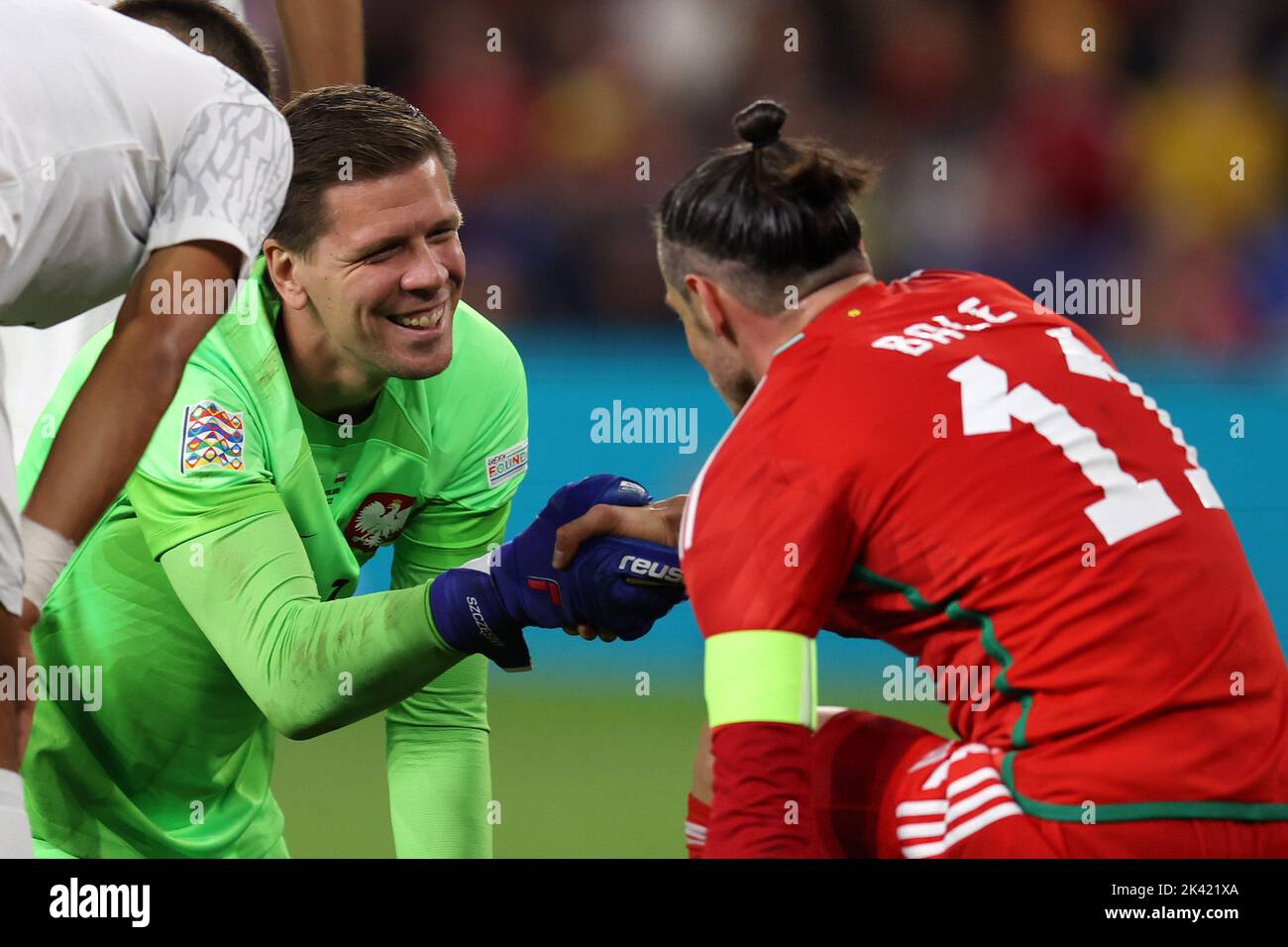 Wojciech Szczesny, the goalkeeper of Poland gives a helping hand to ...