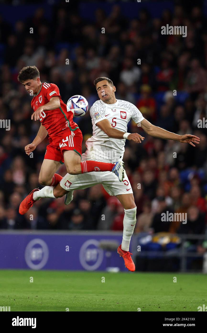 Daniel James of Wales collides with Jan Bednarek of Poland (r). UEFA ...