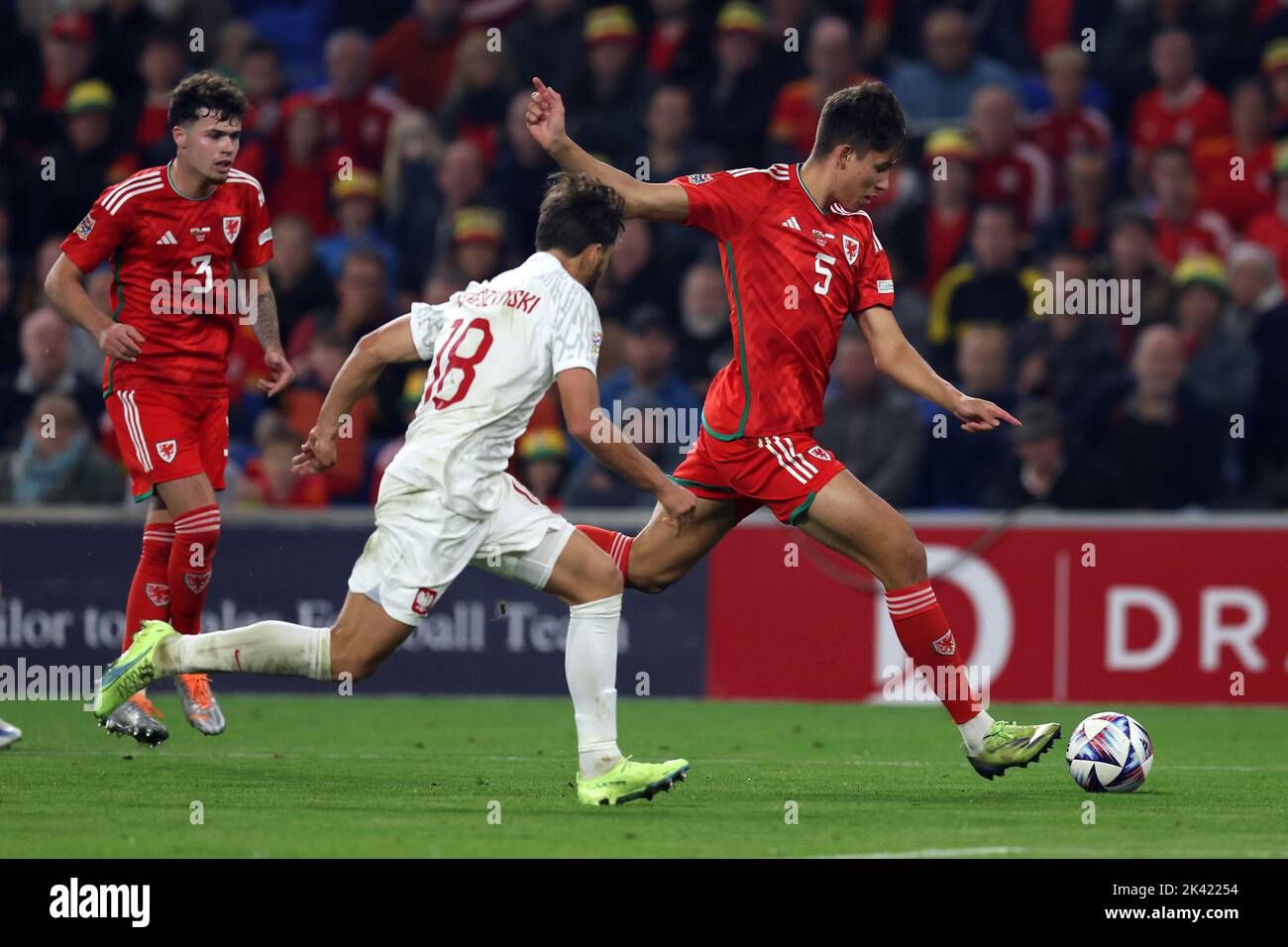 Rubin Colwill of Wales (r) plays a cross into the box. UEFA Nations ...