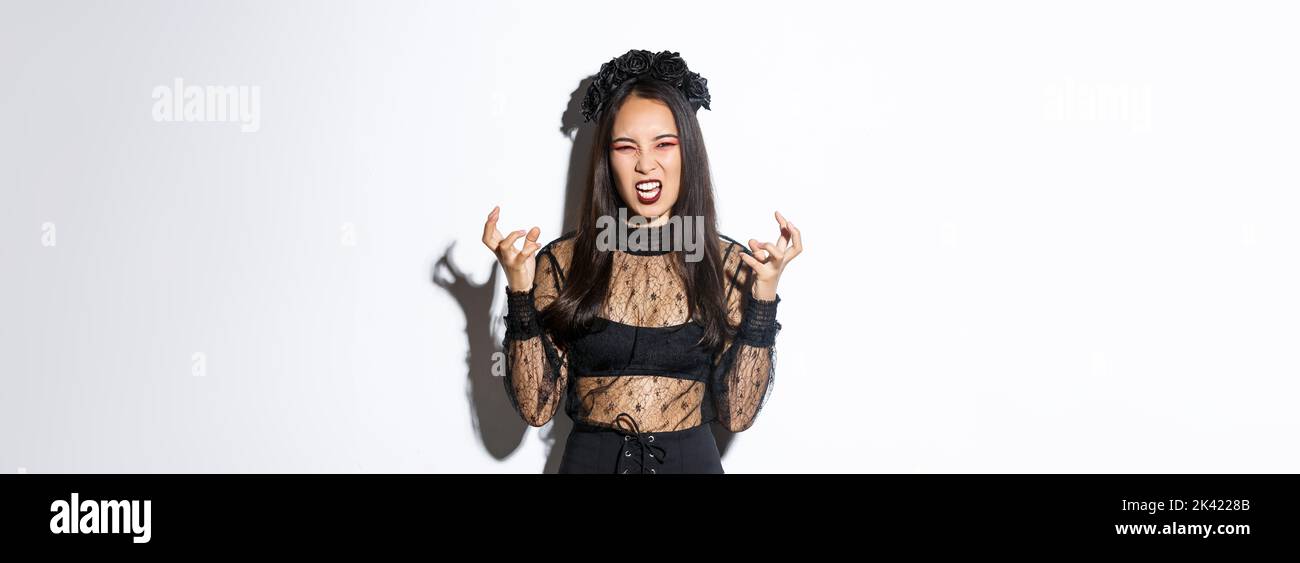 Image of woman in halloween costume looking like angry evil witch ...