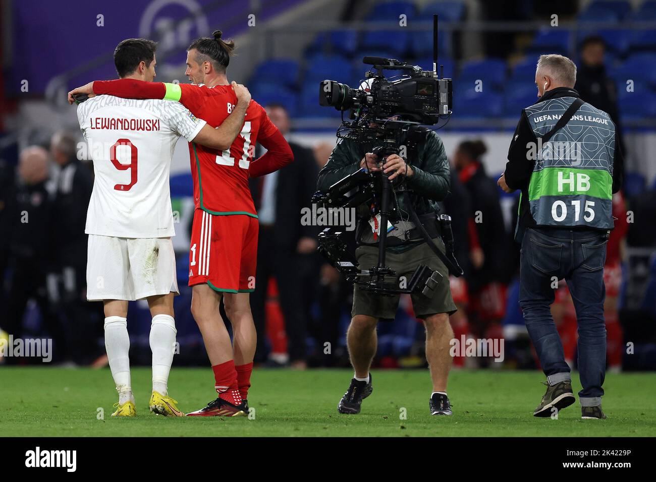 Gareth Bale of Wales (r) chats with Robert Lewandowski of Poland at the ...