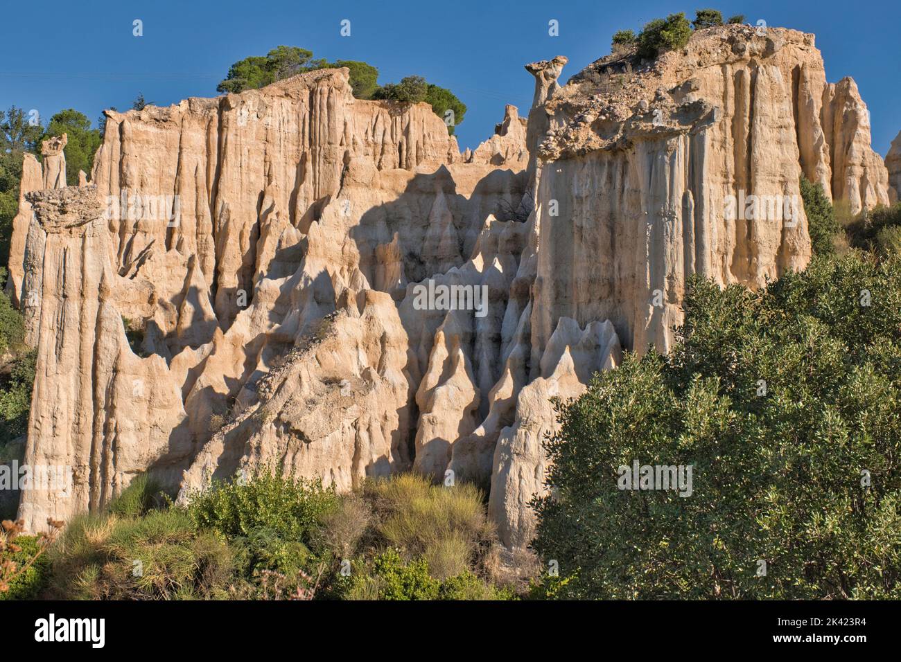 France, Pyrénées-Orientales. Steep sculpted sandstone cliffs and ...