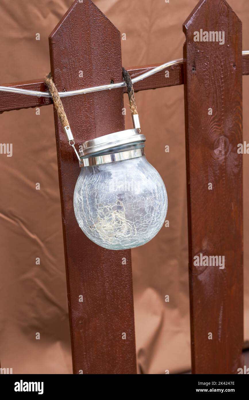 Hanging broken light bulb in hi-res stock photography and images - Alamy
