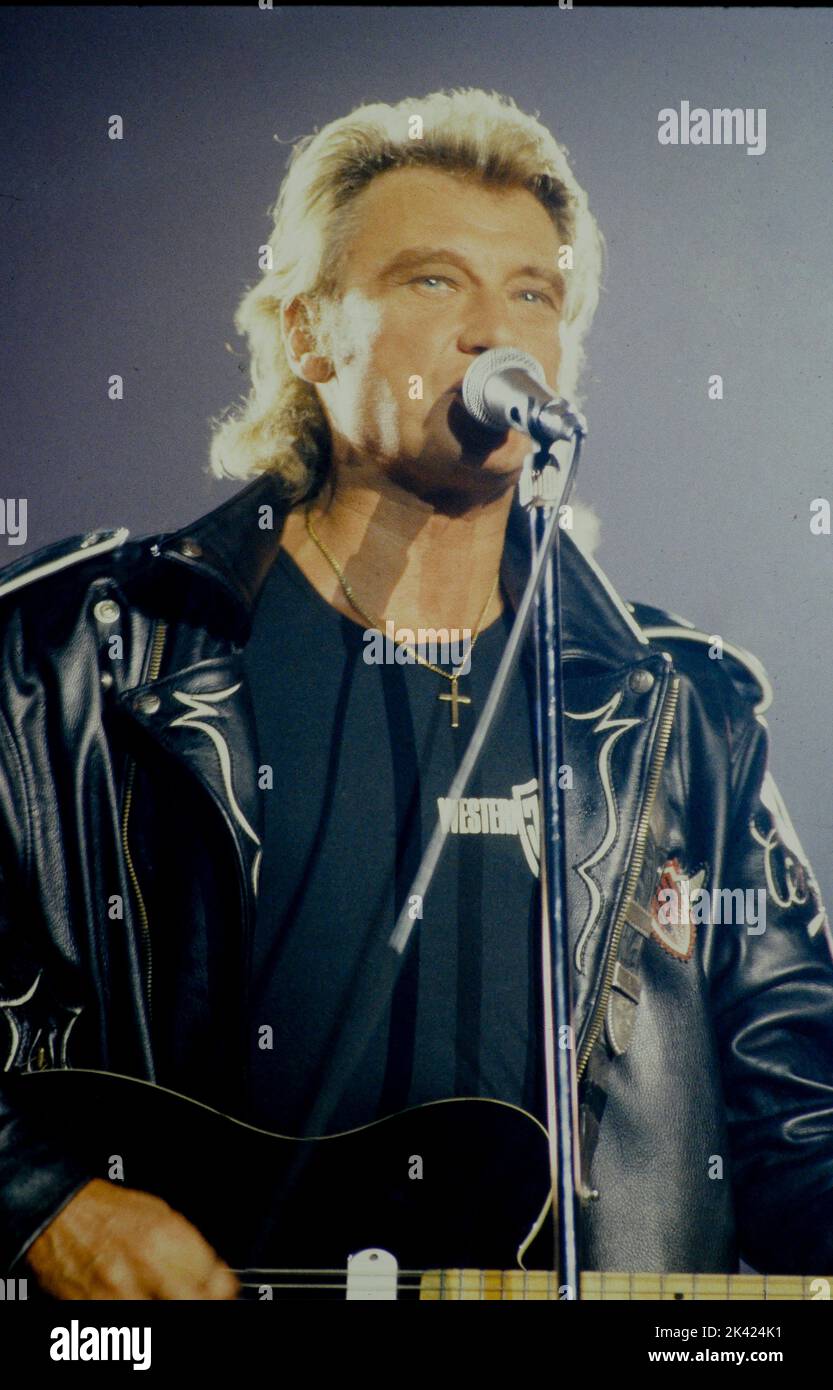 Archives 90ies: Rock singer Johnny Halliday performs in Lyon, France ...