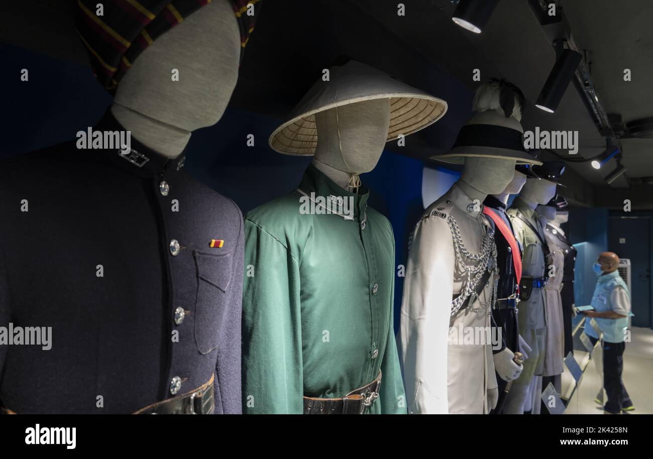 Diffferent police uniform display at Hong Kong Police Museum. The ...