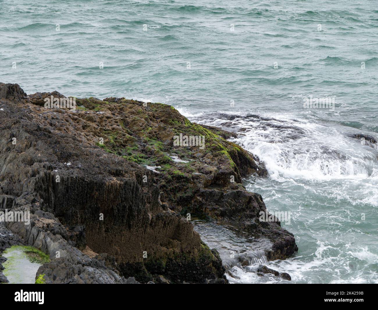 Wild rocks and sea water, landscape, rock formation beside body of ...