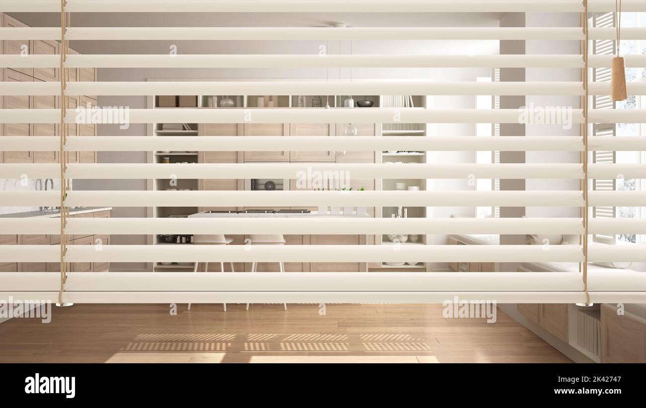 White venetian blinds close up view, over modern wooden kitchen with ...