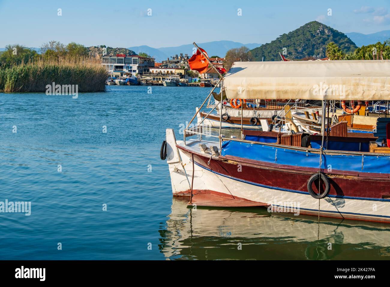 Touristic river boats with tourists in Dalyan resort, Turkey Stock ...