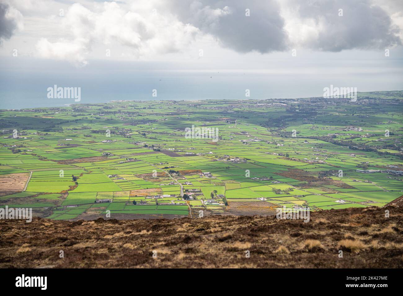 A view from the Mourne Mountains looking out to Ballymartin in Northern ...