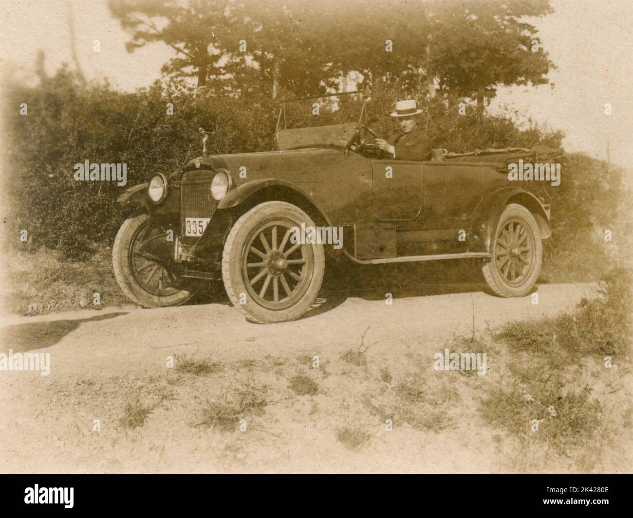 Man driving an old convertible car, Italy 1920s Stock Photo - Alamy