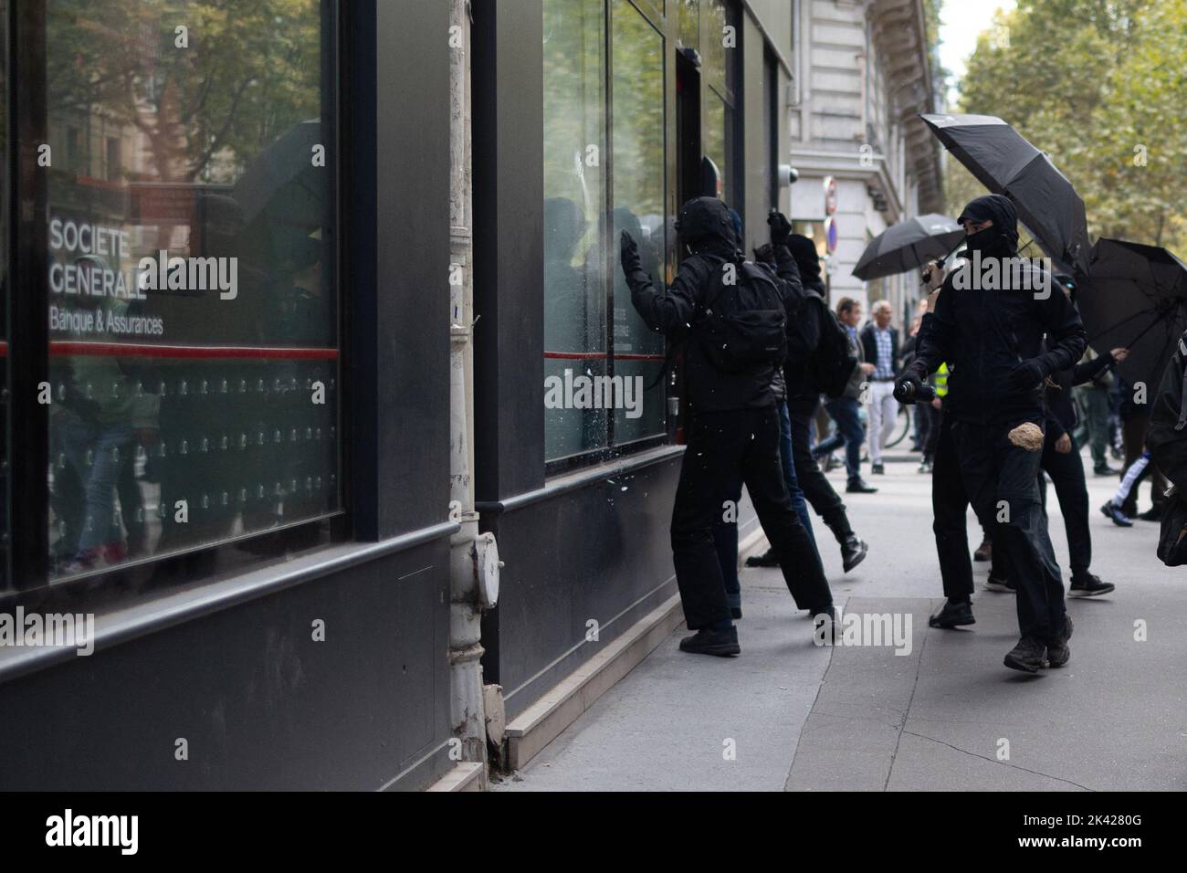 Paris, France, September 29, 2022. Members of the black bloc attack a ...