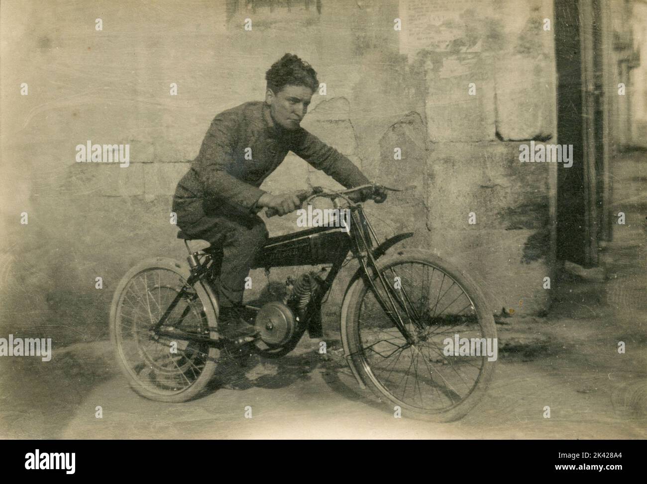 Man driving an old motorbike, Italy 1920s Stock Photo - Alamy