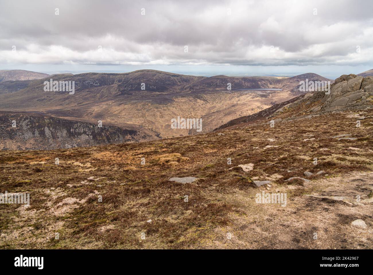 A view from the peak of Slieve Binnian across the Mourne Mountains in ...