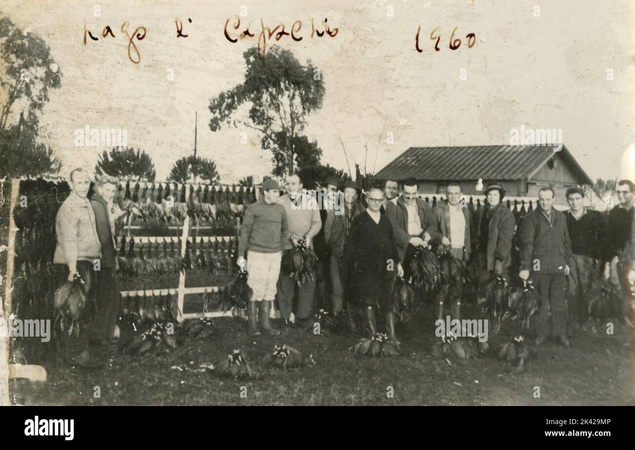 Group of hunters with loads of pheasants, Capalbio, Italy 1960 Stock ...