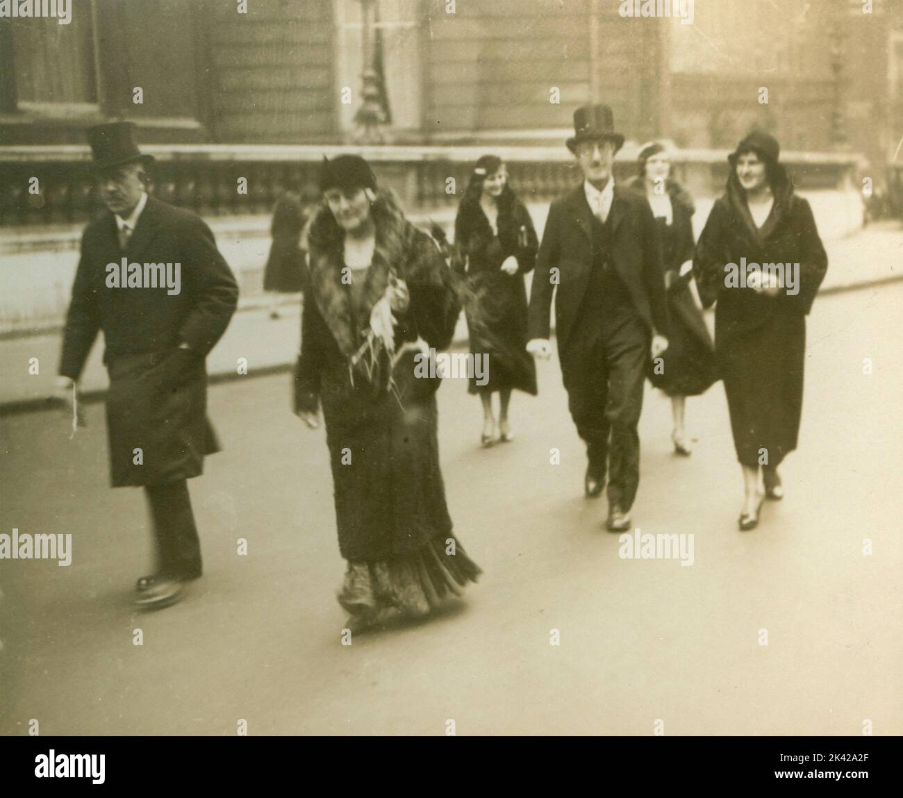 Group of elegant people crossing the street, London UK 1920s Stock ...
