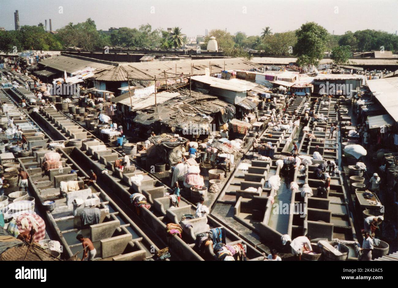 View of slum housing and laundry basins, Mumbai, India 1990s Stock ...