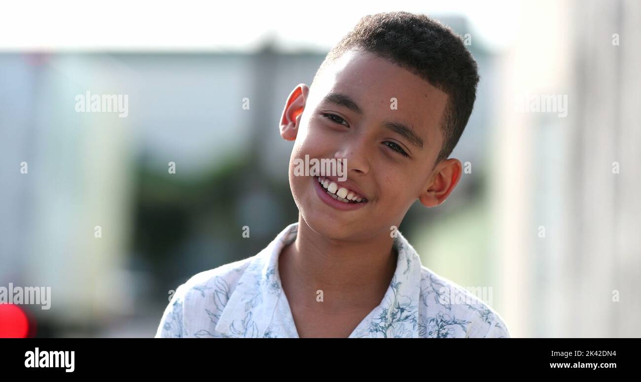 Brazilian little boy child smiling face close-up outside Stock Photo ...