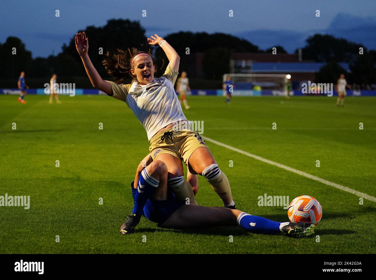 Leicester City's Sam Tierney (left) is challenged by Everton's Lucy ...