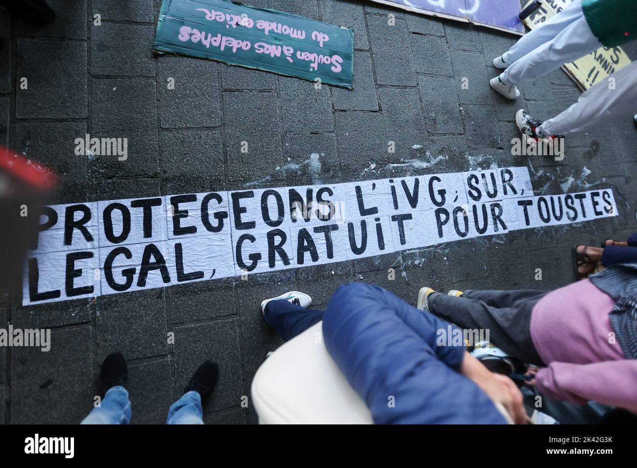 Protesters display a banner protecting the rights to abortion during ...