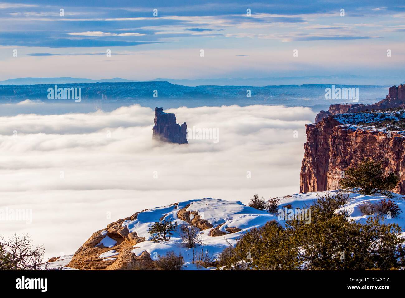 The Candlestick Tower rises above a sea of fog in the Green River Basin ...