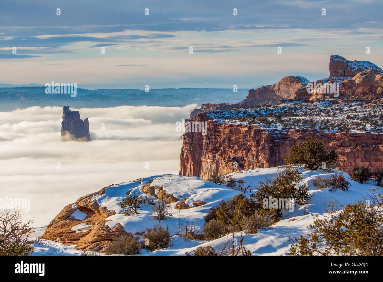 The Candlestick Tower rises above a sea of fog in the Green River Basin ...