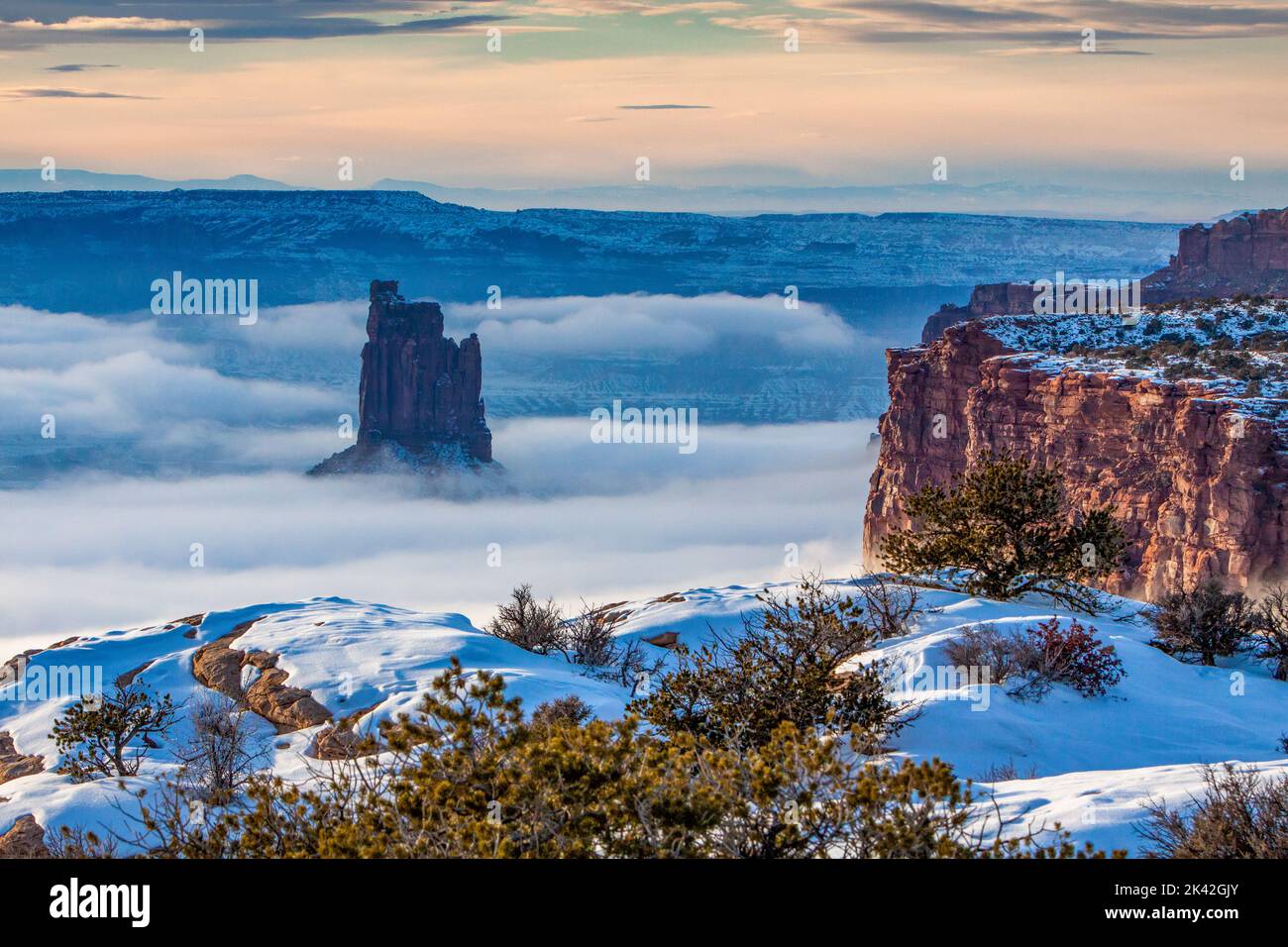 The Candlestick Tower rises above a sea of fog in the Green River Basin ...