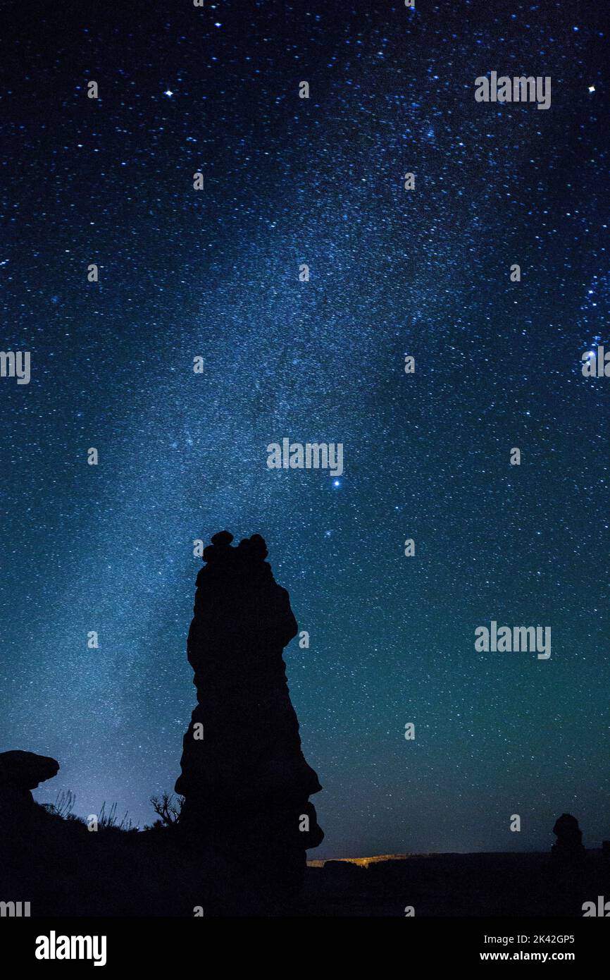 The Milky Way over an Entrada sandstone rock pillar in the Spires and ...