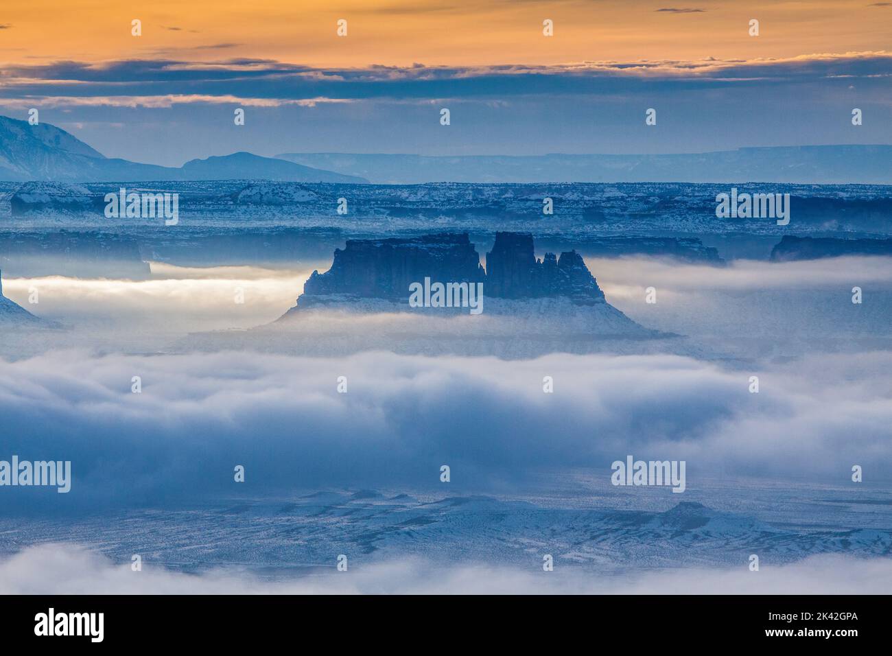North Point & the Orange Cliffs rise above a sea of fog in the Green ...