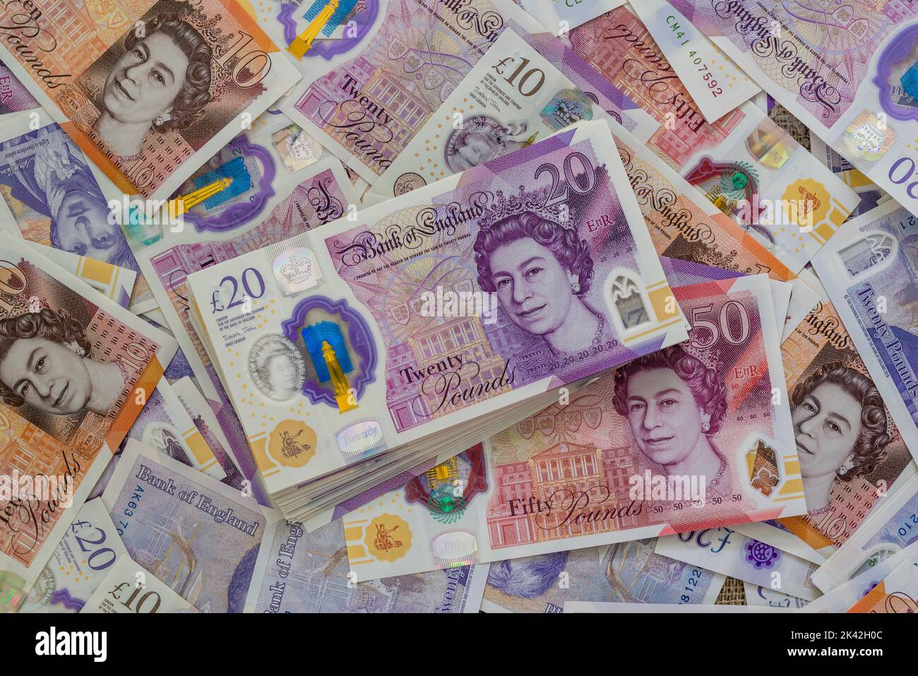 Hand holding uk cash isolated hi-res stock photography and images - Alamy