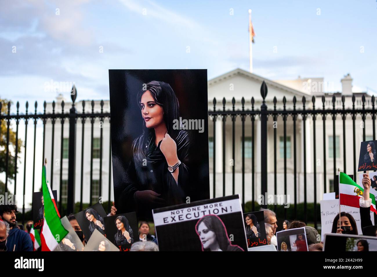 Washington, United States. 28th Sep, 2022. Protesters carry a large ...
