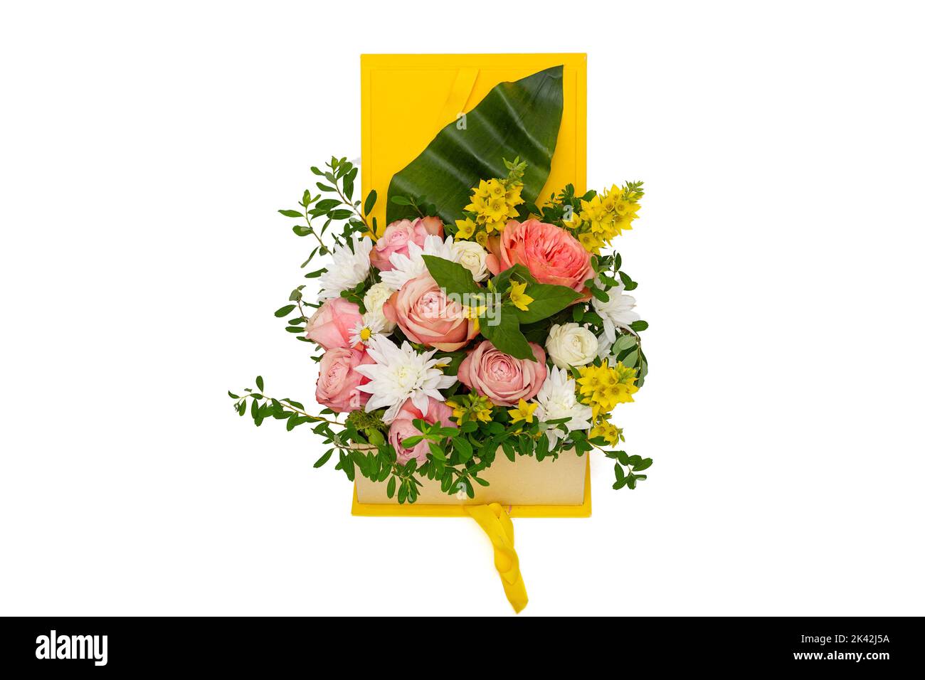 Original flower arrangement in a yellow gift box, isolated on a white ...