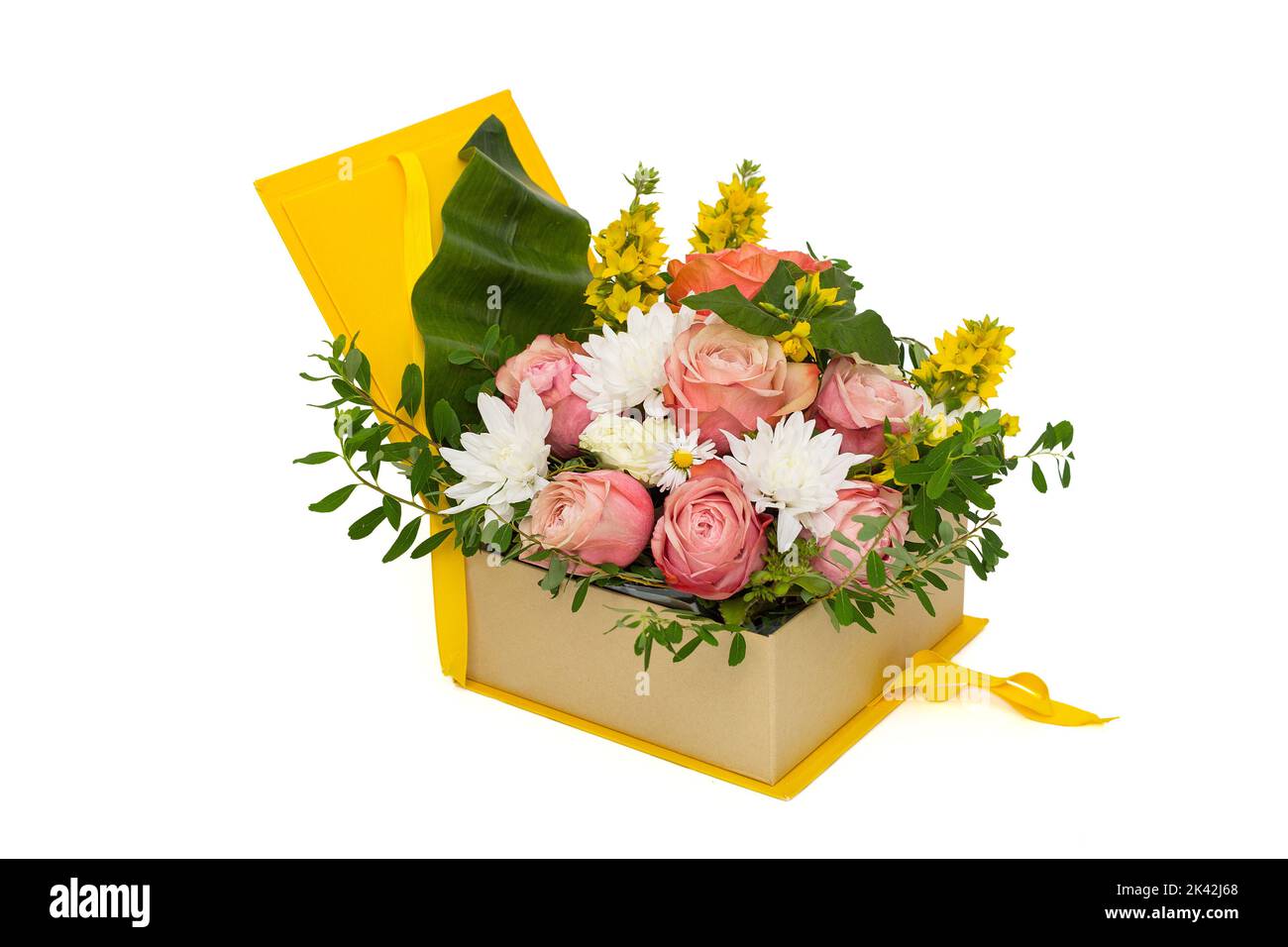 Original flower arrangement in a yellow gift box, isolated on a white ...