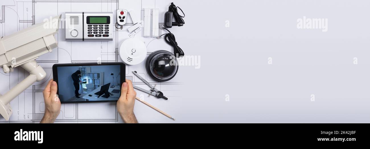 Monitoring Security Camera in Office. Intruder Alert Stock Photo - Alamy