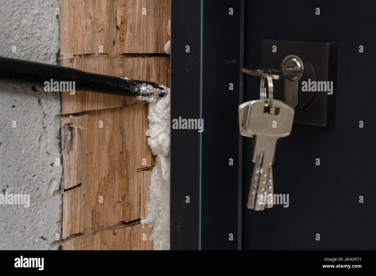 Keys in the door lock of interior doors, mounting foam and doors Stock ...