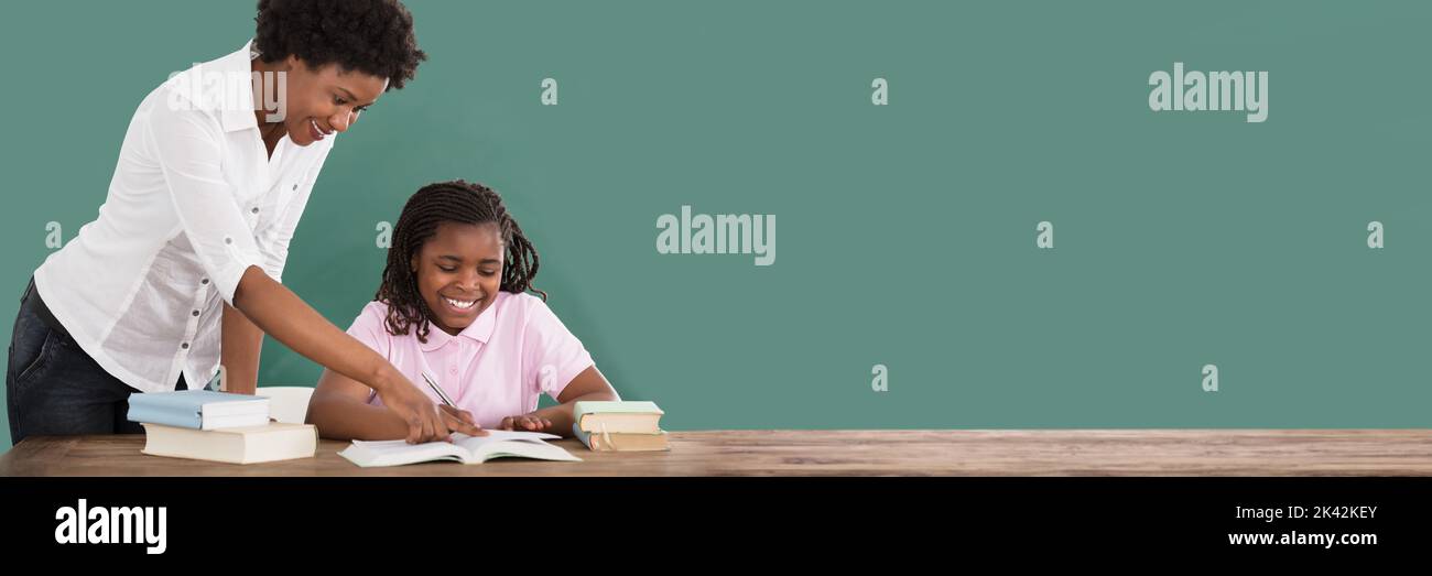 Black teacher black student hi-res stock photography and images - Alamy