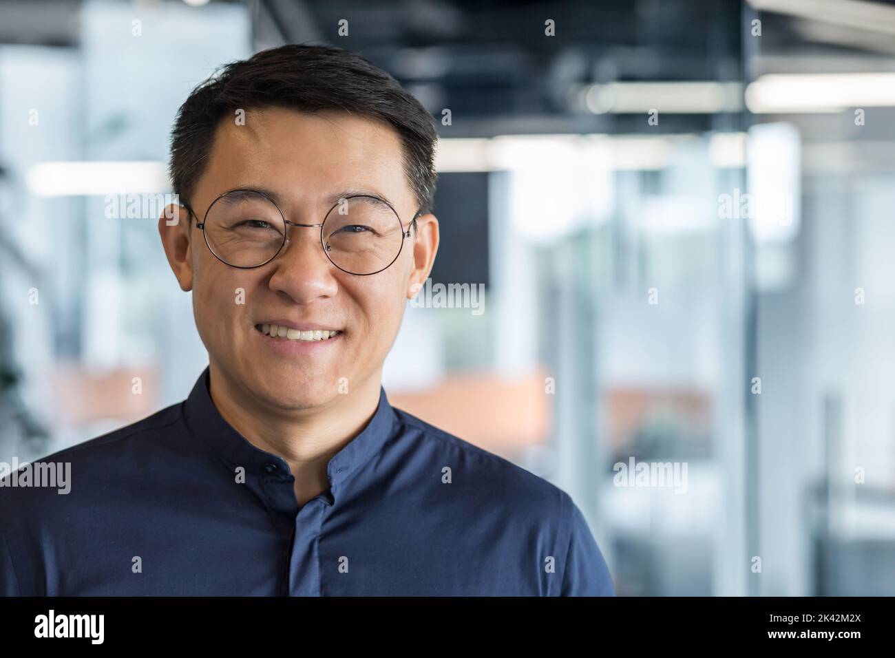 Close Up Photo Portrait Of Successful Young Asian Investor Man In