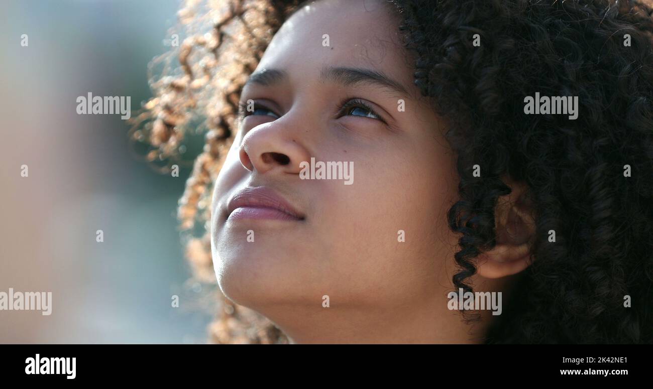 Child face looking at sky, close-up kid looks up Stock Photo - Alamy